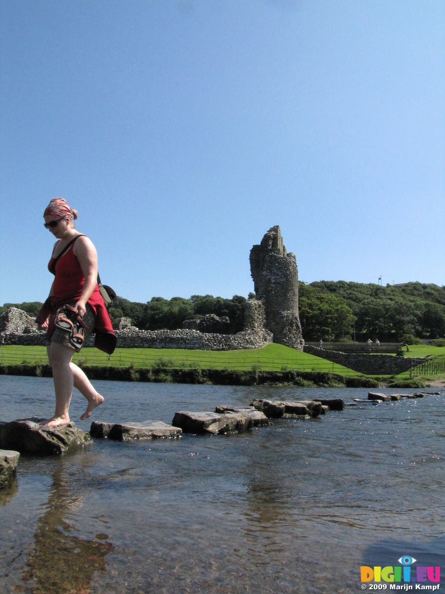 Picture SX07975 Kristina crossing stepping stones at Ogmore Castle ...